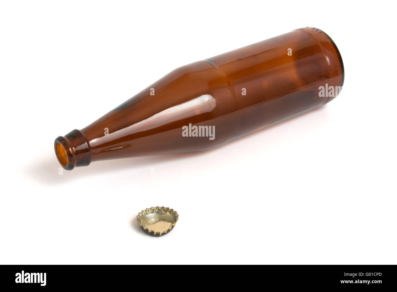 Empty bottle of beer with a cap on a white background it is isolated ...