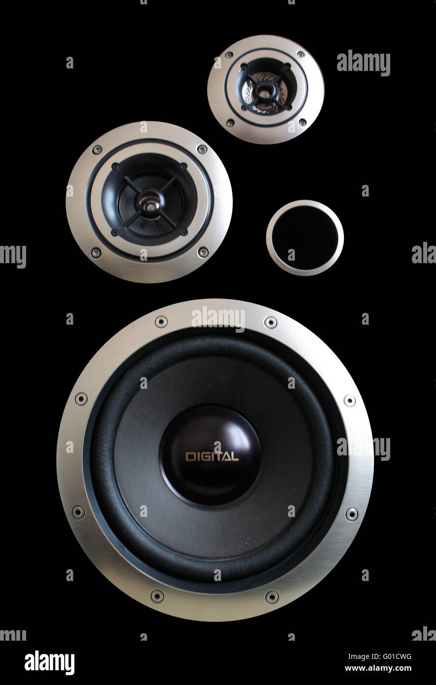 Three speakers and a passive radiator isolated on a black background ...