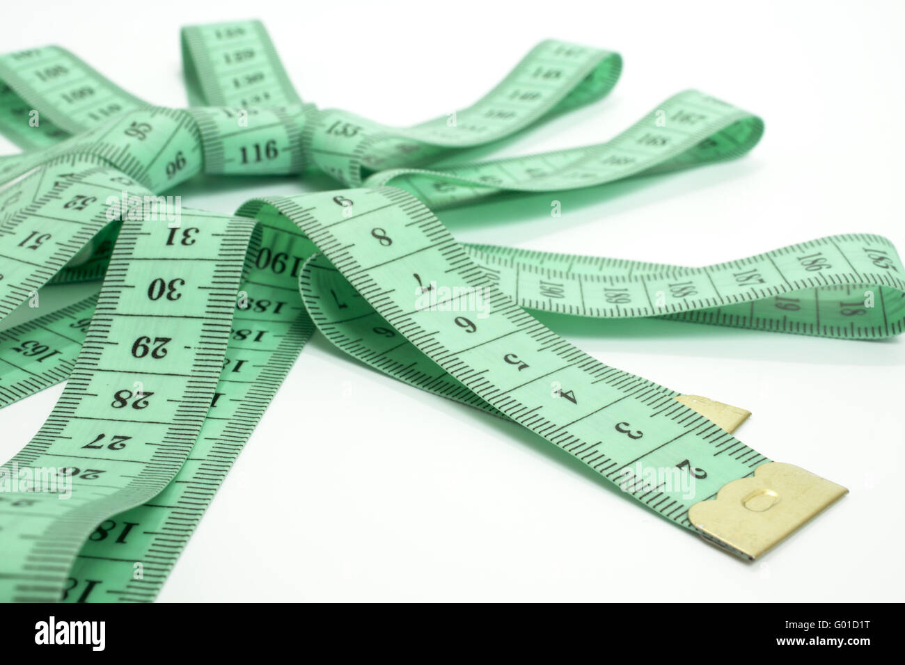 green tape measure on white background in the form of a star Stock ...