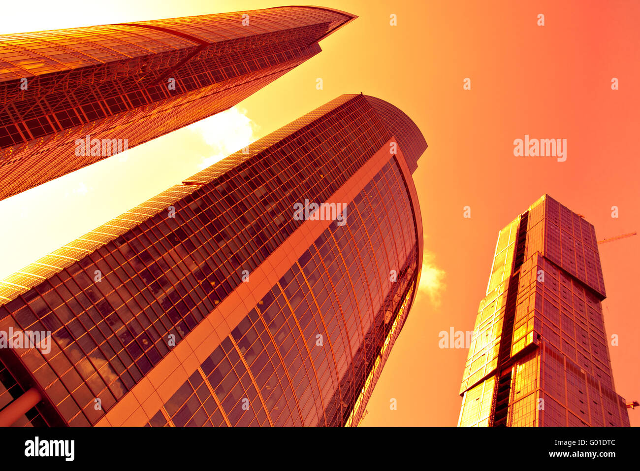 Underside diagonal view to new business center at sunset Stock Photo ...