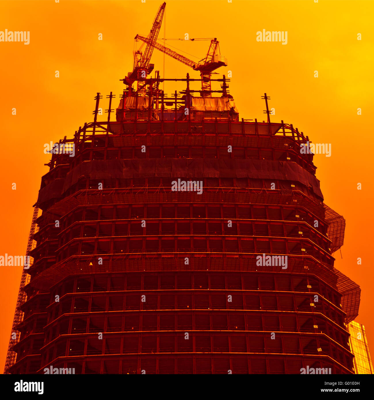 Underside view to business center head at sunset Stock Photo - Alamy