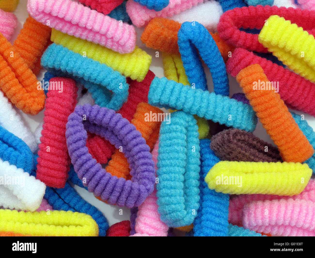A pile of colorful hair elastic bands, close-up Stock Photo - Alamy