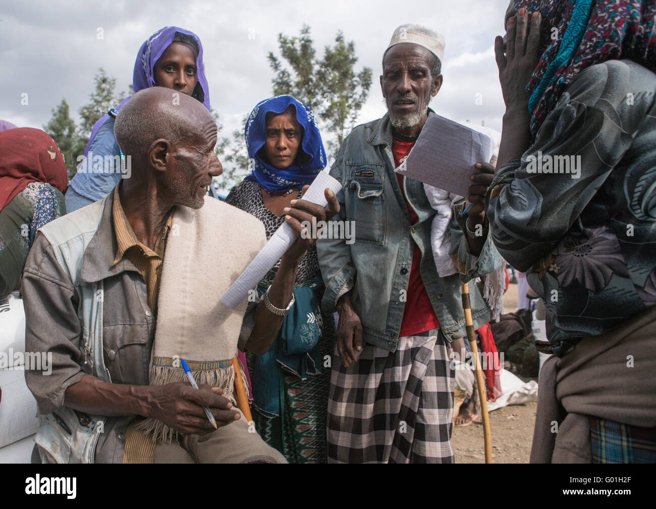 Ethiopia, Semien Wollo Zone, Woldia, ethiopian people wait at a food ...