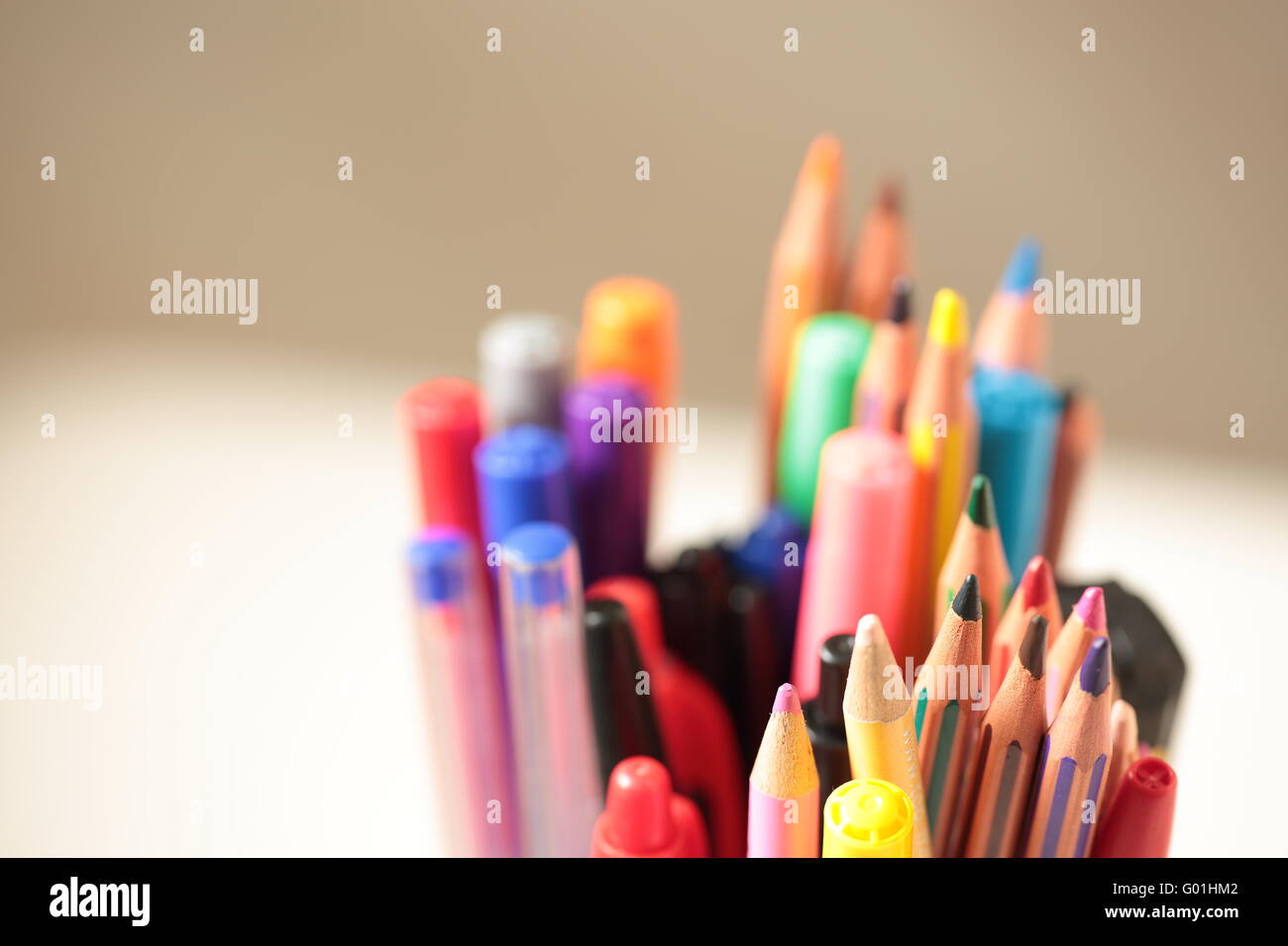 container with pens and pencils of various colors Stock Photo - Alamy