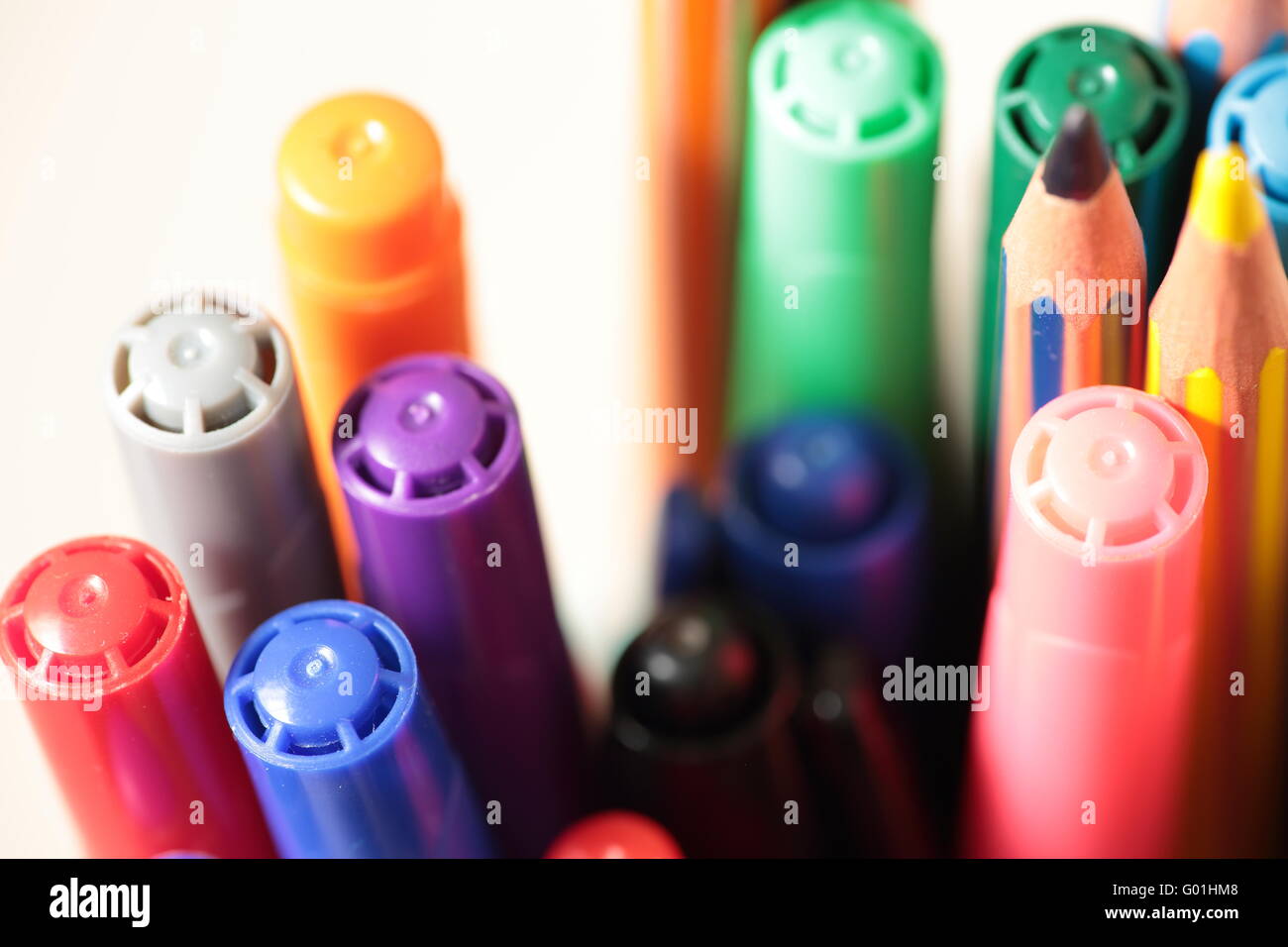 container with pens and pencils of various colors Stock Photo - Alamy