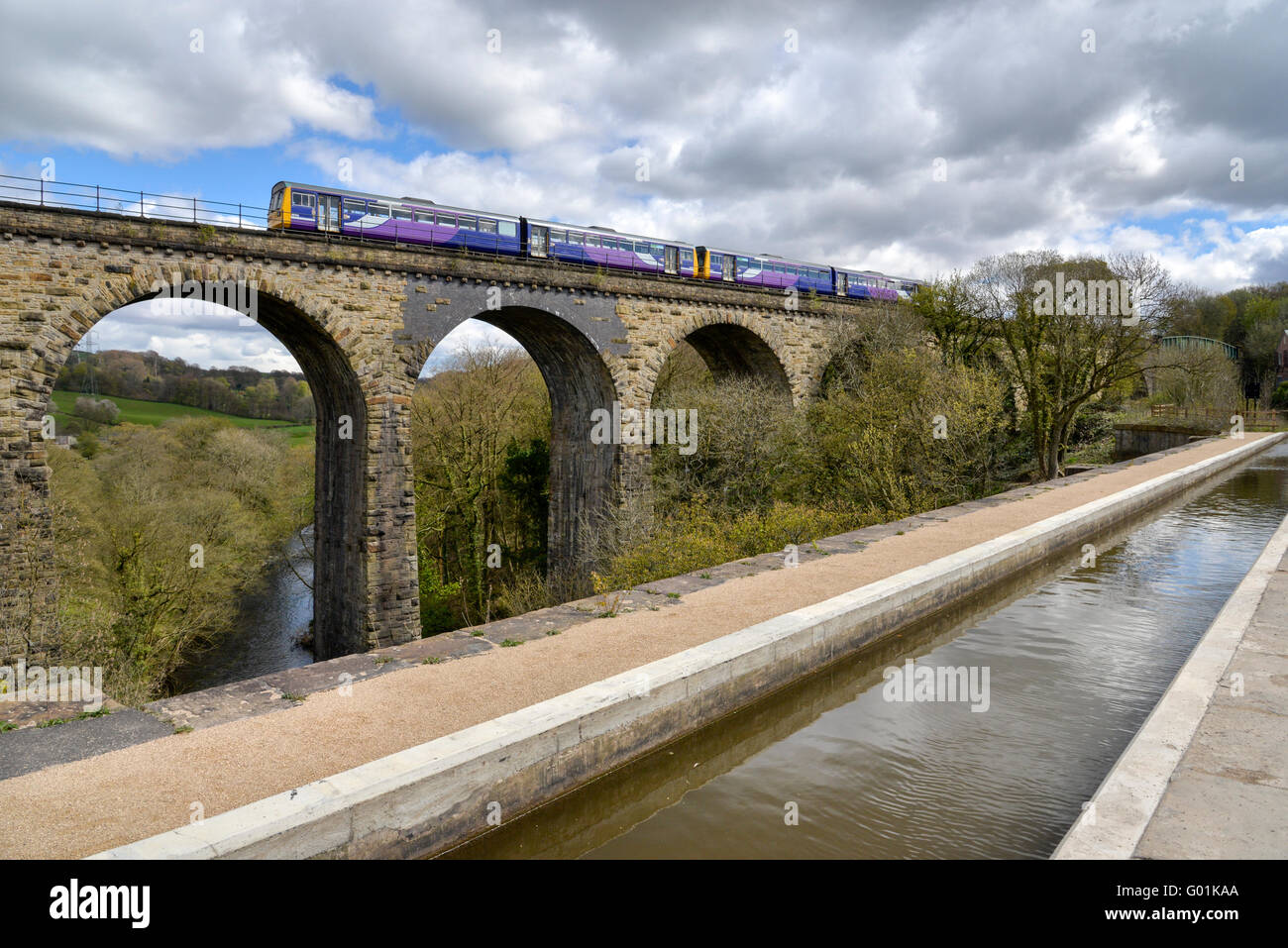 Train on the bridge beside Marple aquaduct on the Peak Forest canal ...