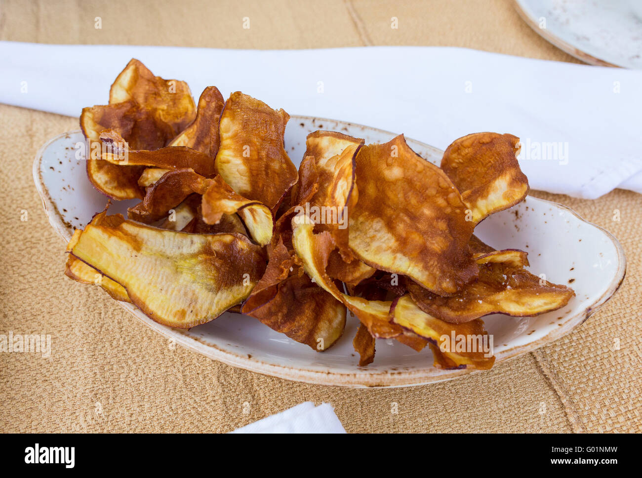 COSTA RICA - Fried sweet potato chips on plate Stock Photo - Alamy