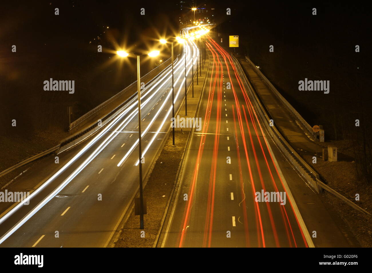 Road at night Stock Photo - Alamy