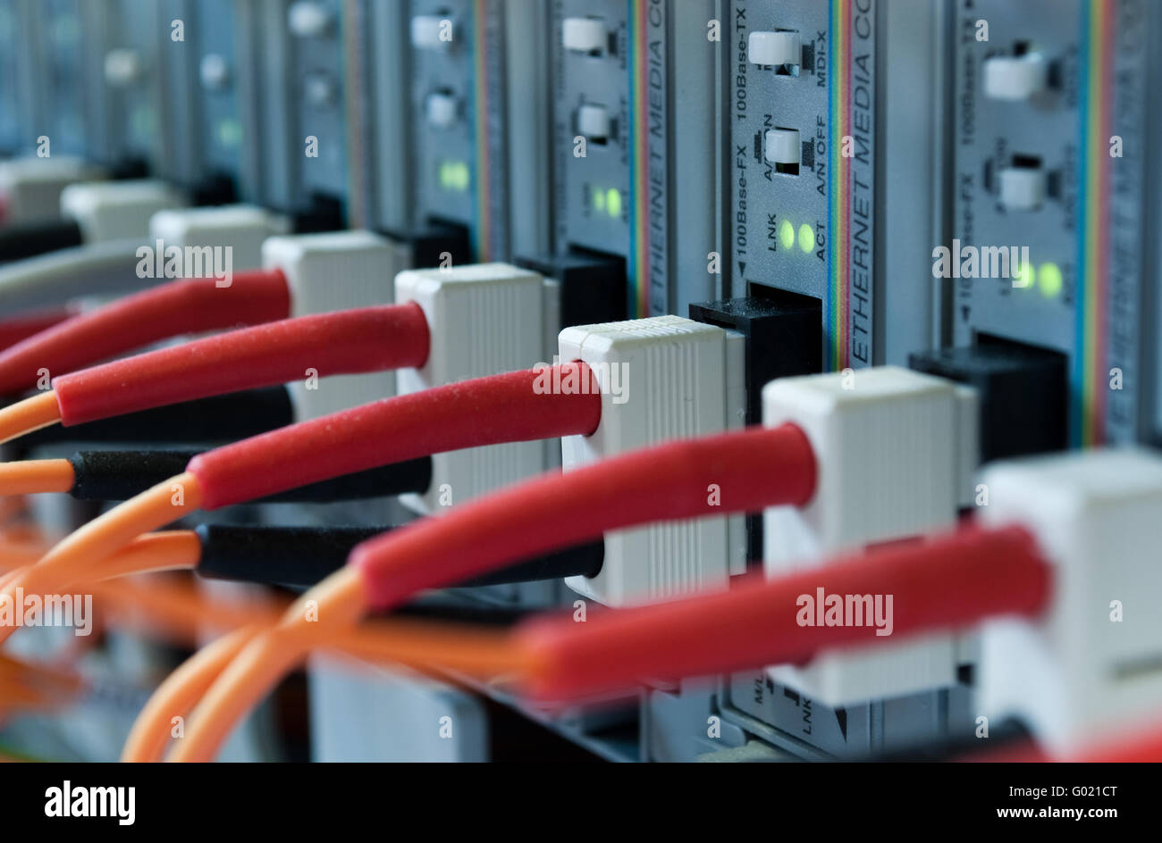 Fiber optic cable to computer Stock Photo - Alamy