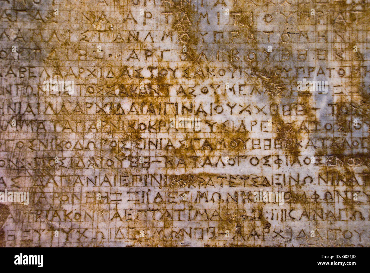 Stone background with antique Greek inscriptions Stock Photo - Alamy