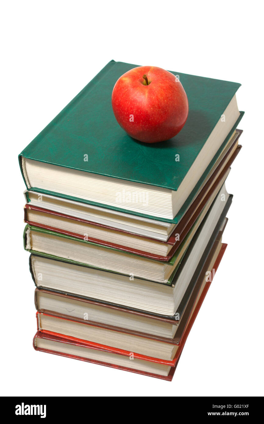 apple and stack of books isolated on white background Stock Photo - Alamy