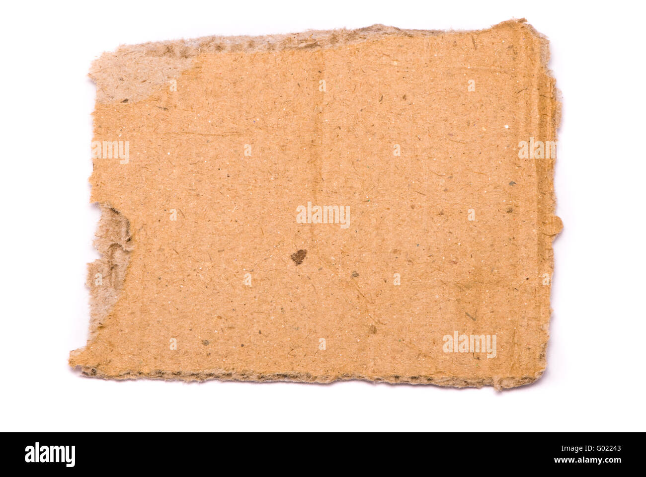 Ripped piece of cardboard on white background Stock Photo - Alamy