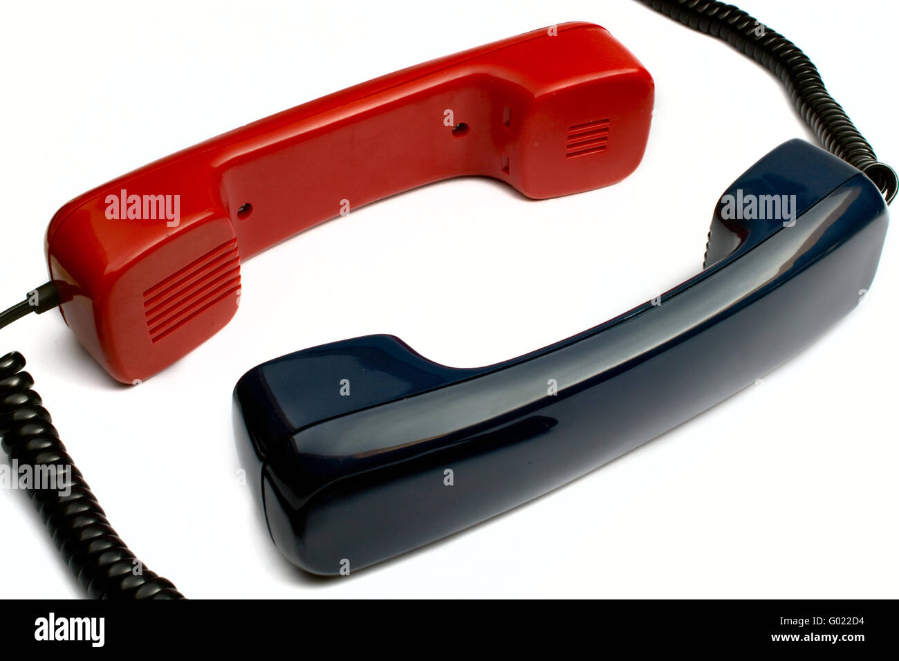 Pair communicating telephone tube dark blue and red color on a white ...