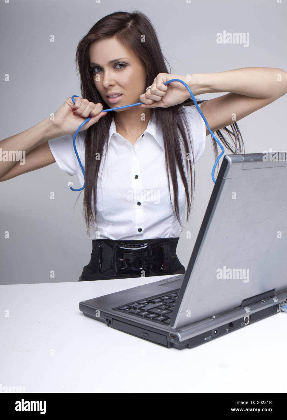 A woman is angry at your computer problems with hardware hi-res stock ...