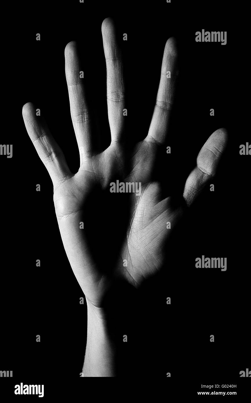 Human hand is drawn by light on a black background Stock Photo - Alamy