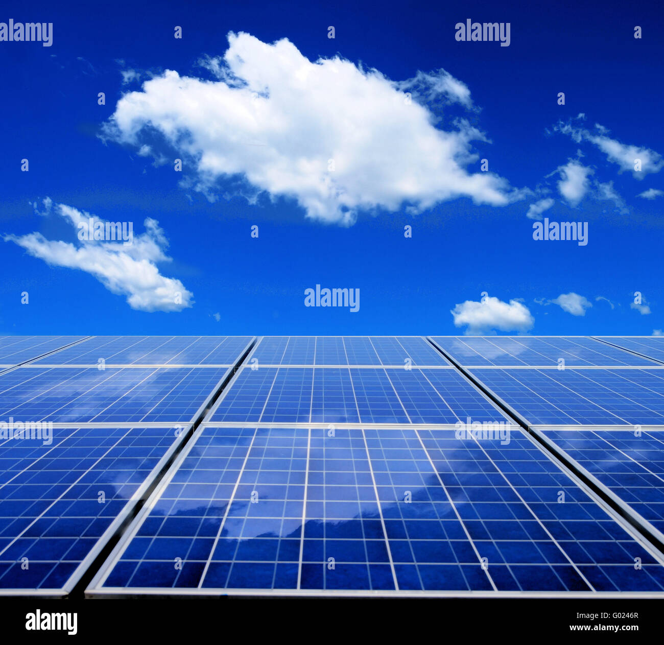 Solar energy panel with blue sky and clouds Stock Photo - Alamy