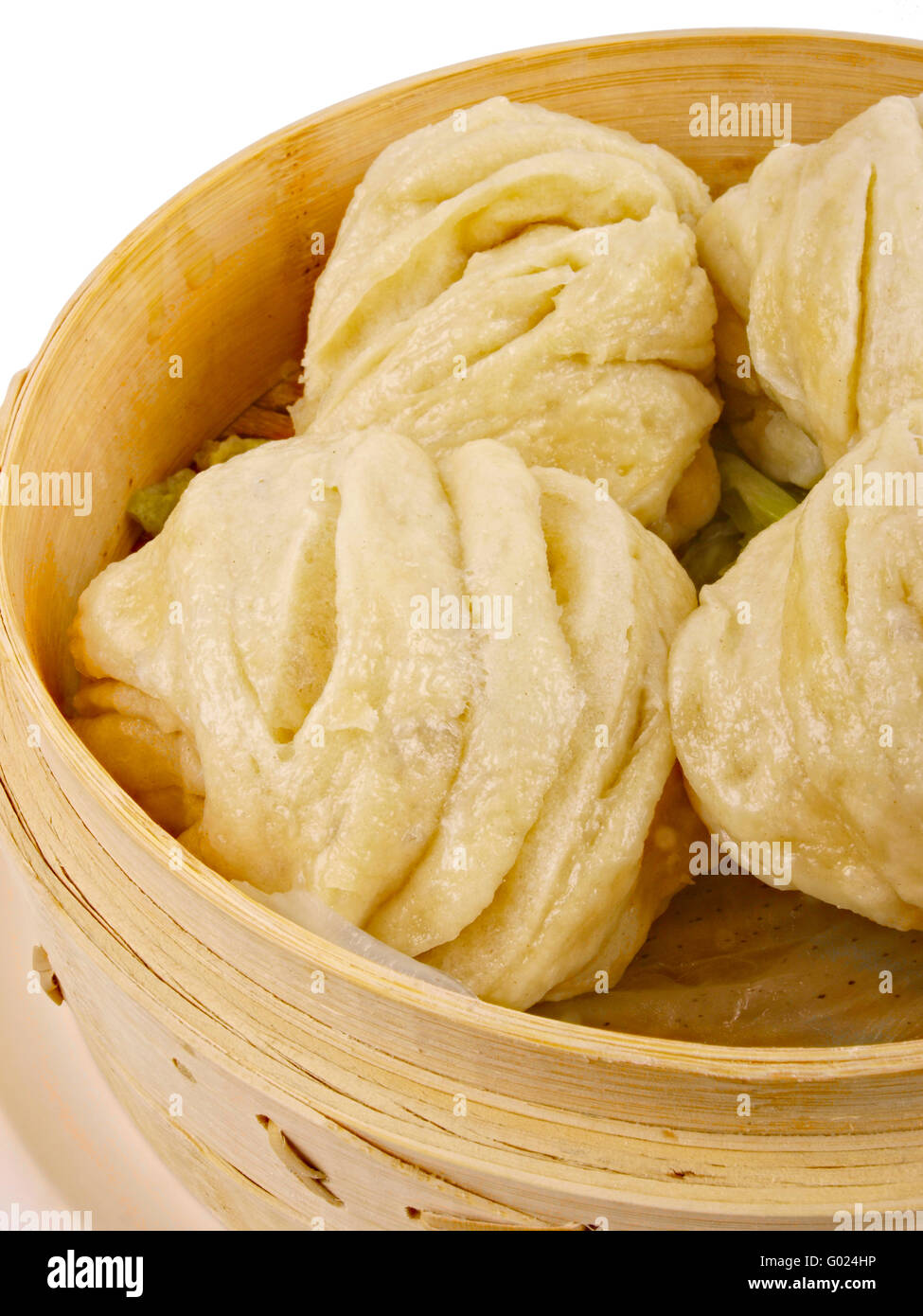 Chinese steamed roll. Close up on white background Stock Photo - Alamy