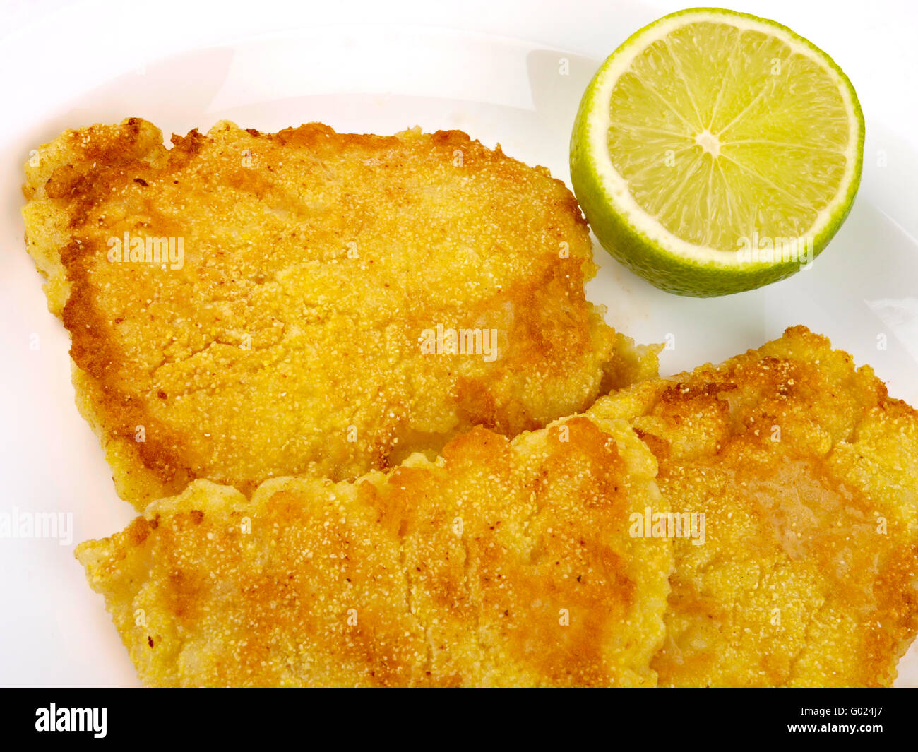 Fish Filet with lemon Stock Photo - Alamy