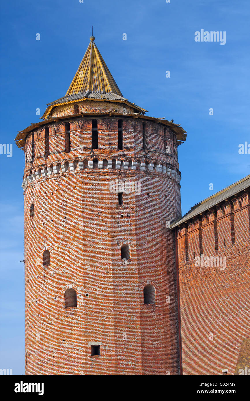 Tower and wall of big castle of red brick and white stone Stock Photo ...