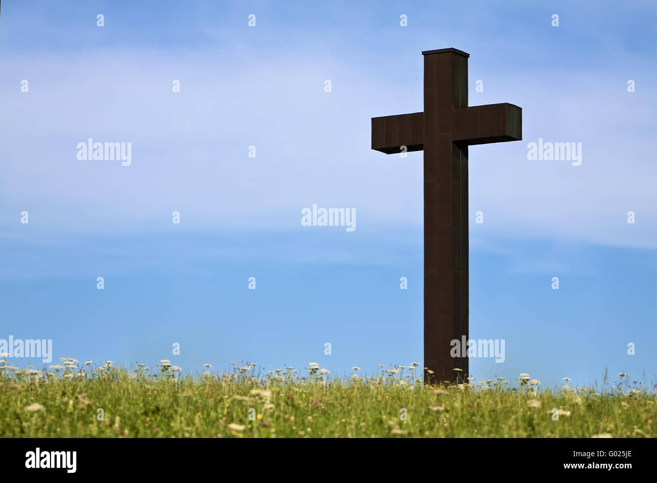 Cross rising into the sky hi-res stock photography and images - Alamy