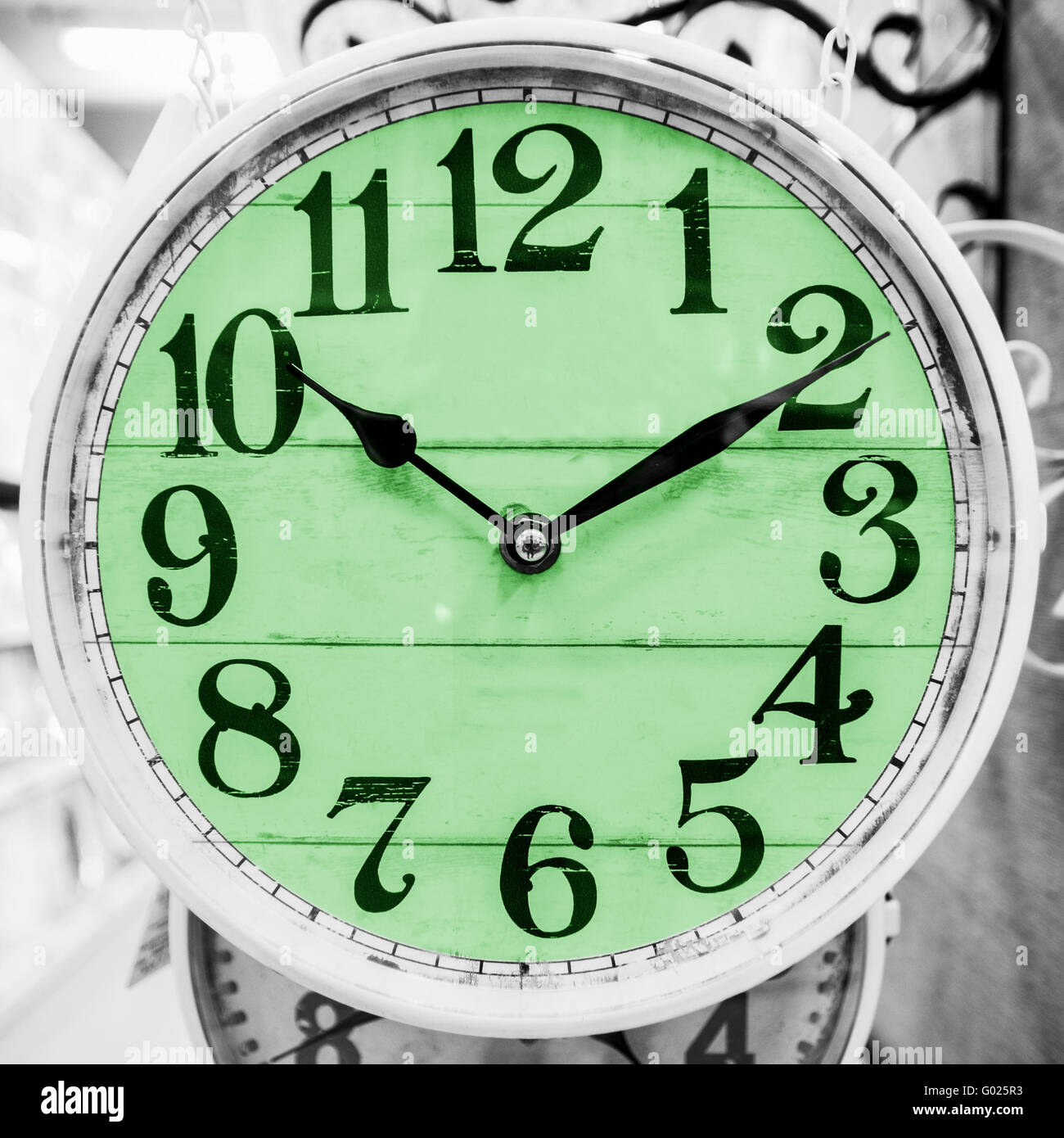 Detail of green clock in a classical style Stock Photo - Alamy