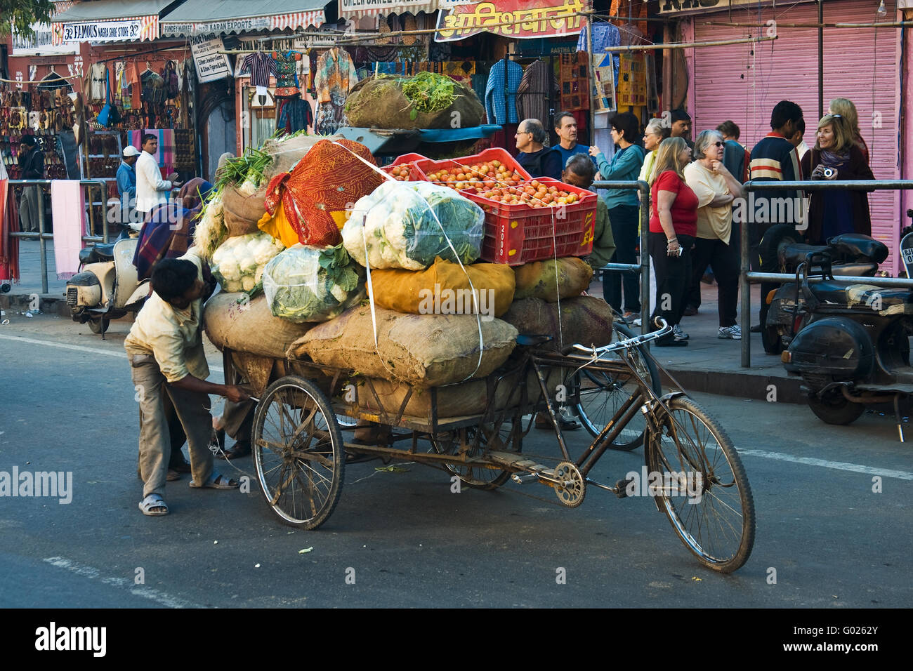 rickshaw fully laden with fruits and vegetables, North India, India ...
