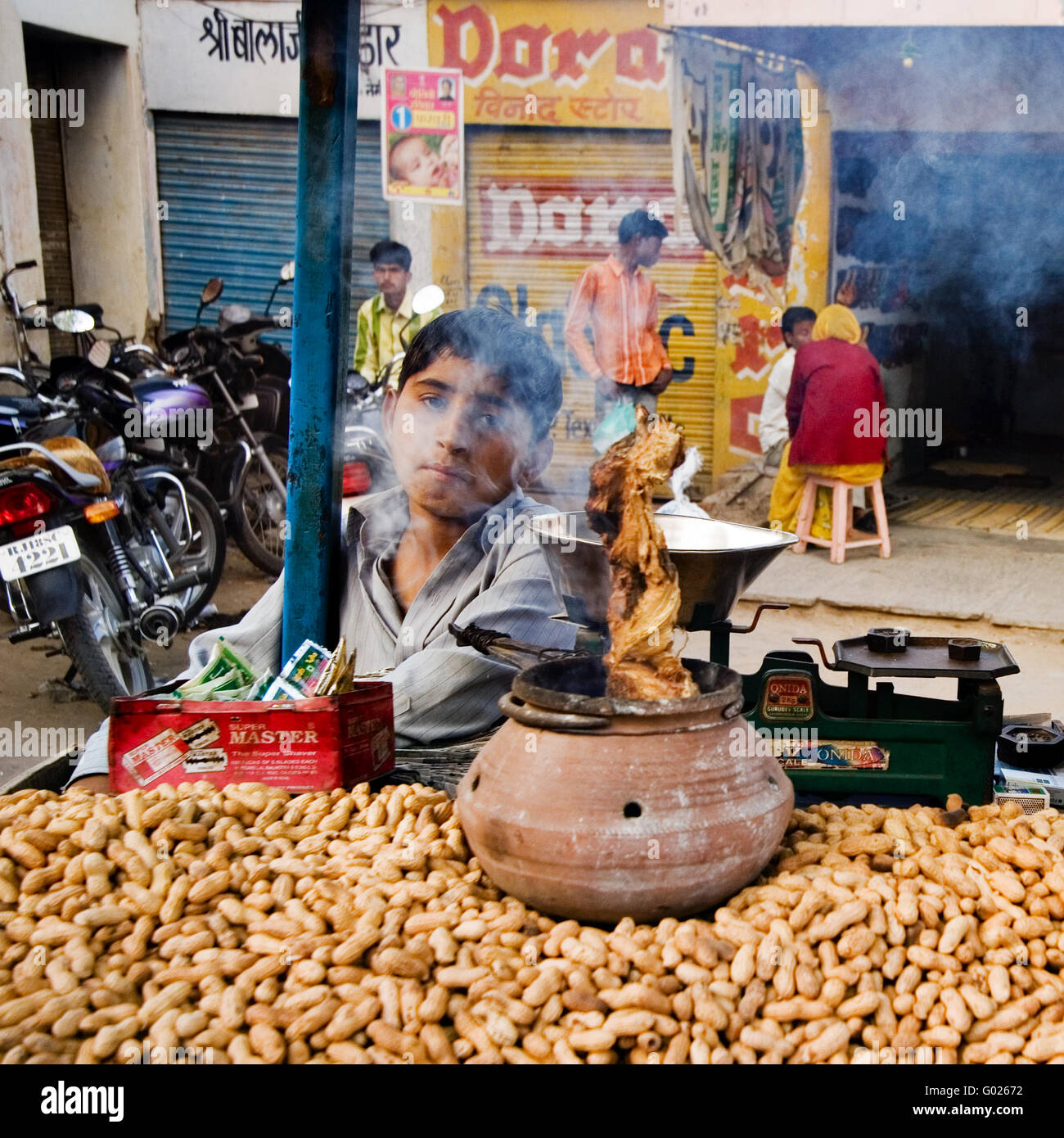 indian boyon a market, sells nuts, North India, India, Asia Stock Photo ...