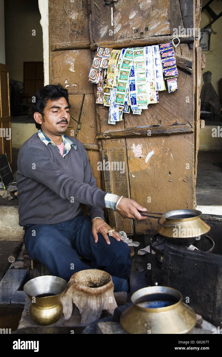 indian man cooks coffee on a market, North India, India, Asia Stock ...