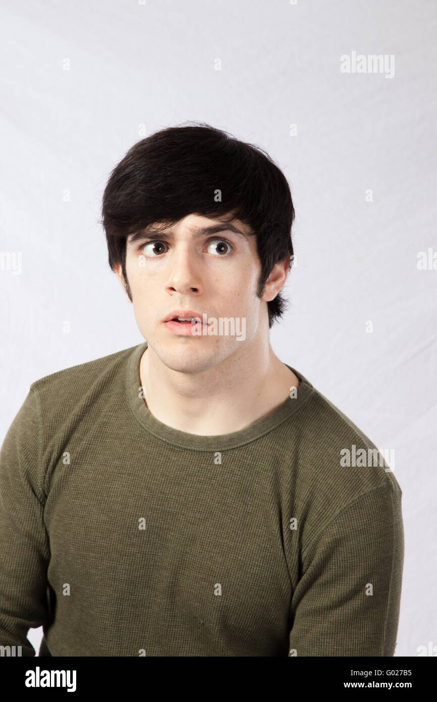 Handsome man with a surprised expression Stock Photo - Alamy