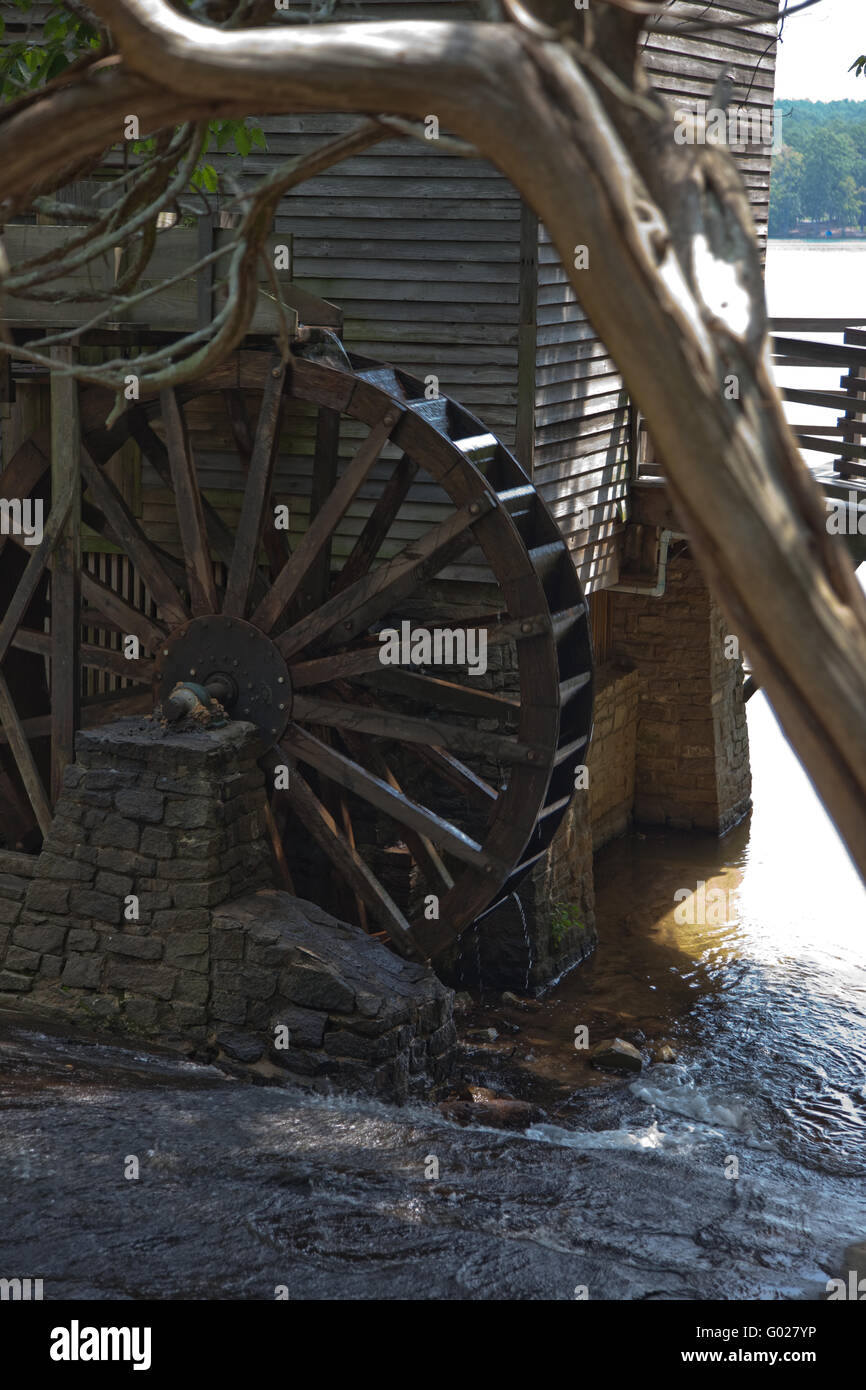 Old grist mill wooden water wheel by a stream Stock Photo - Alamy