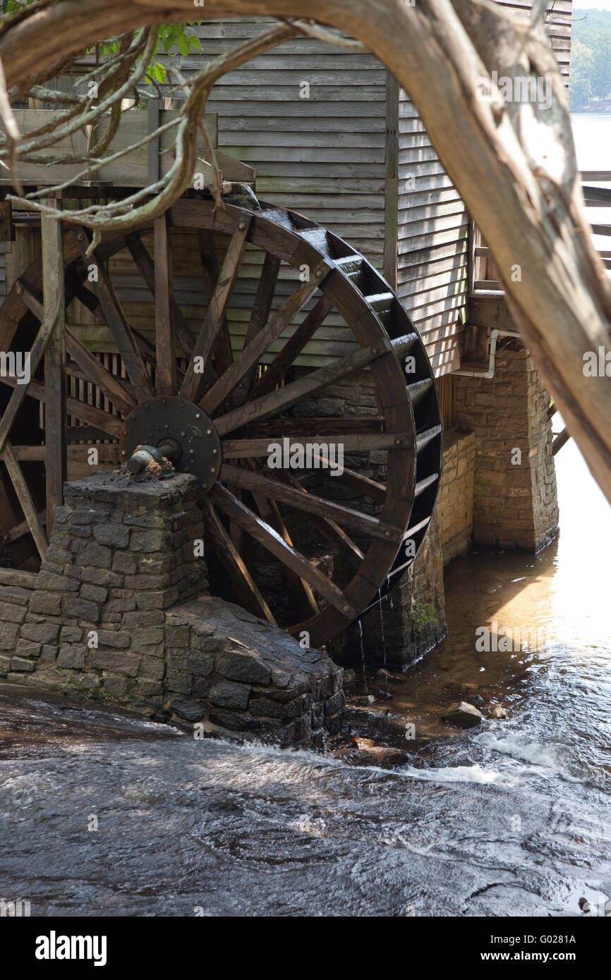 Old grist mill wooden water wheel by a stream Stock Photo - Alamy