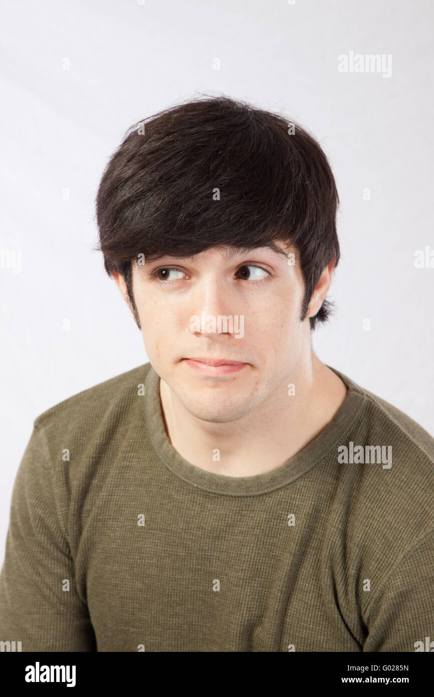 Handsome man looking to the left with a happy expression Stock Photo ...