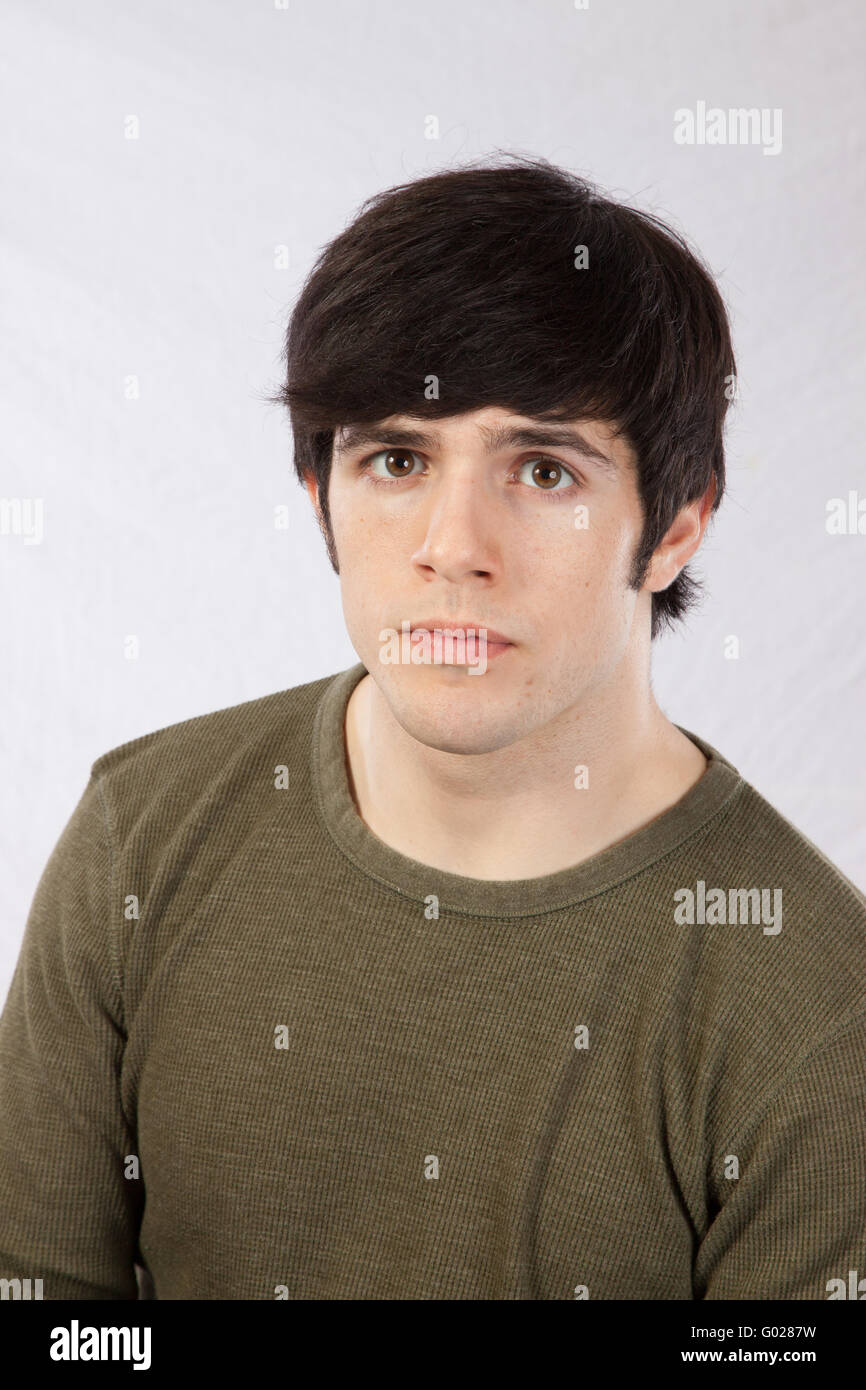 Handsome man looking at the camera with a serious expression Stock ...