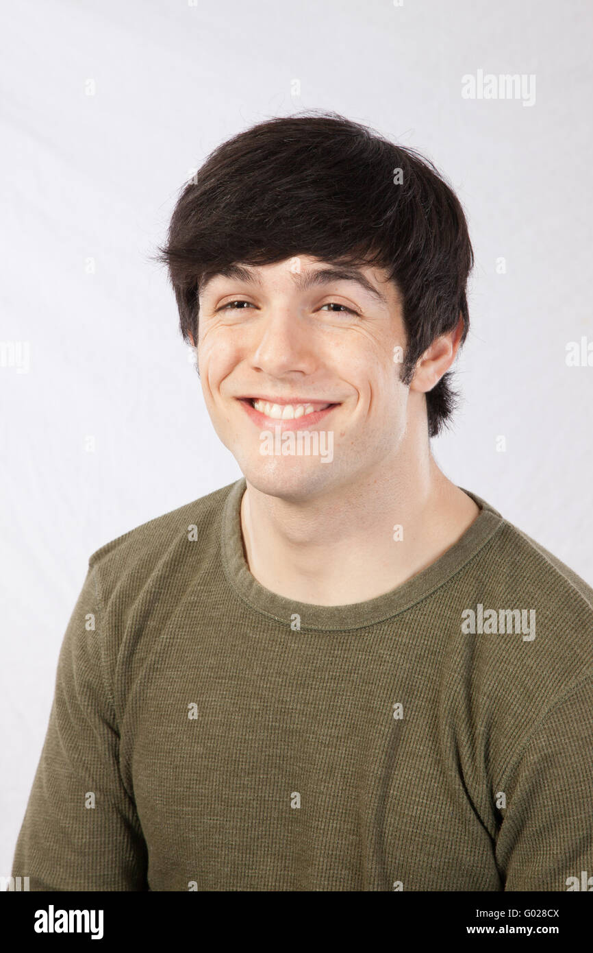 Handsome man smiling at the camera Stock Photo - Alamy