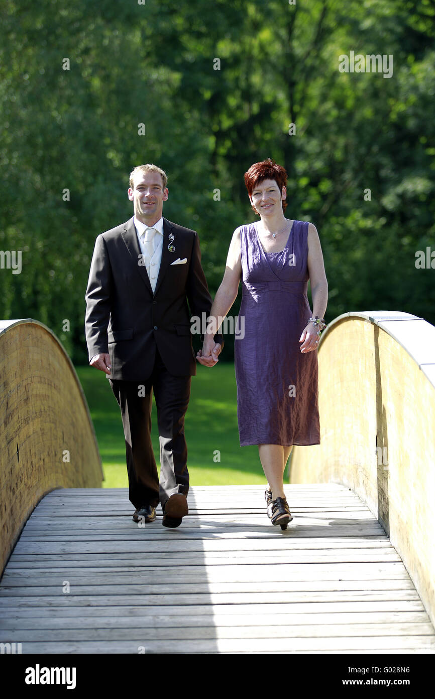 Man walking over a bridge hi-res stock photography and images - Alamy