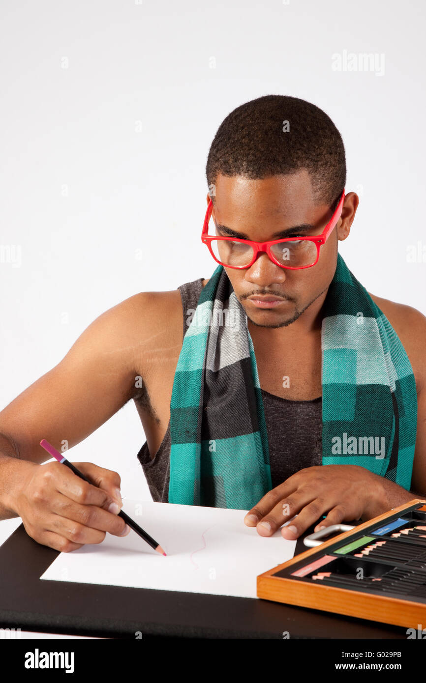 Handsome black man drawing on paper with pastel Stock Photo - Alamy