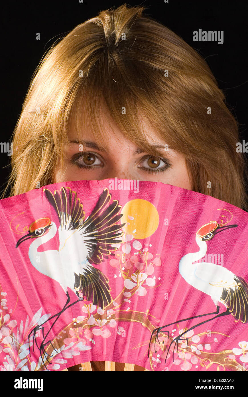 Woman with a Fan Stock Photo - Alamy