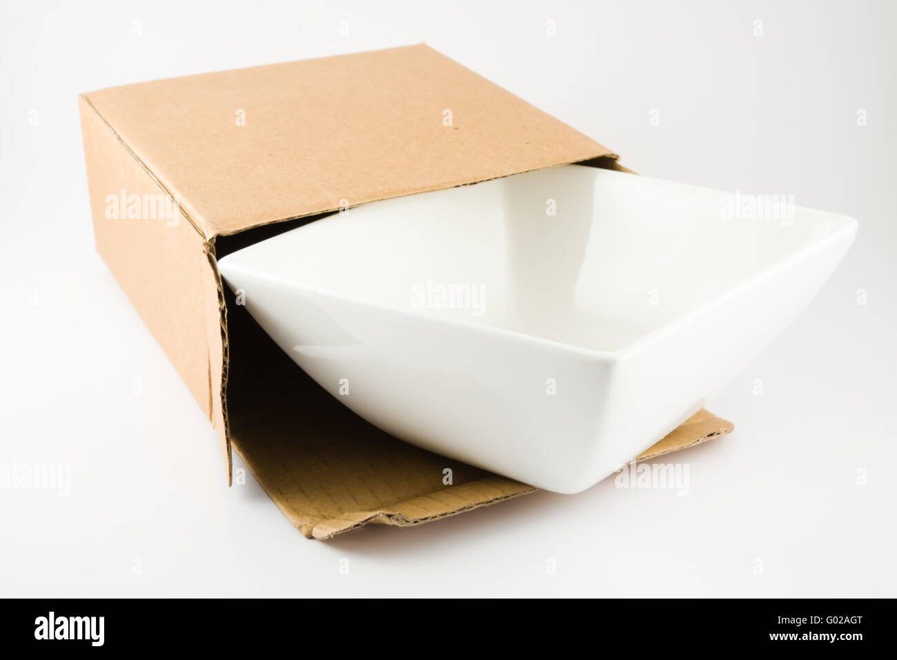 Dish in Cardboard Box Stock Photo - Alamy