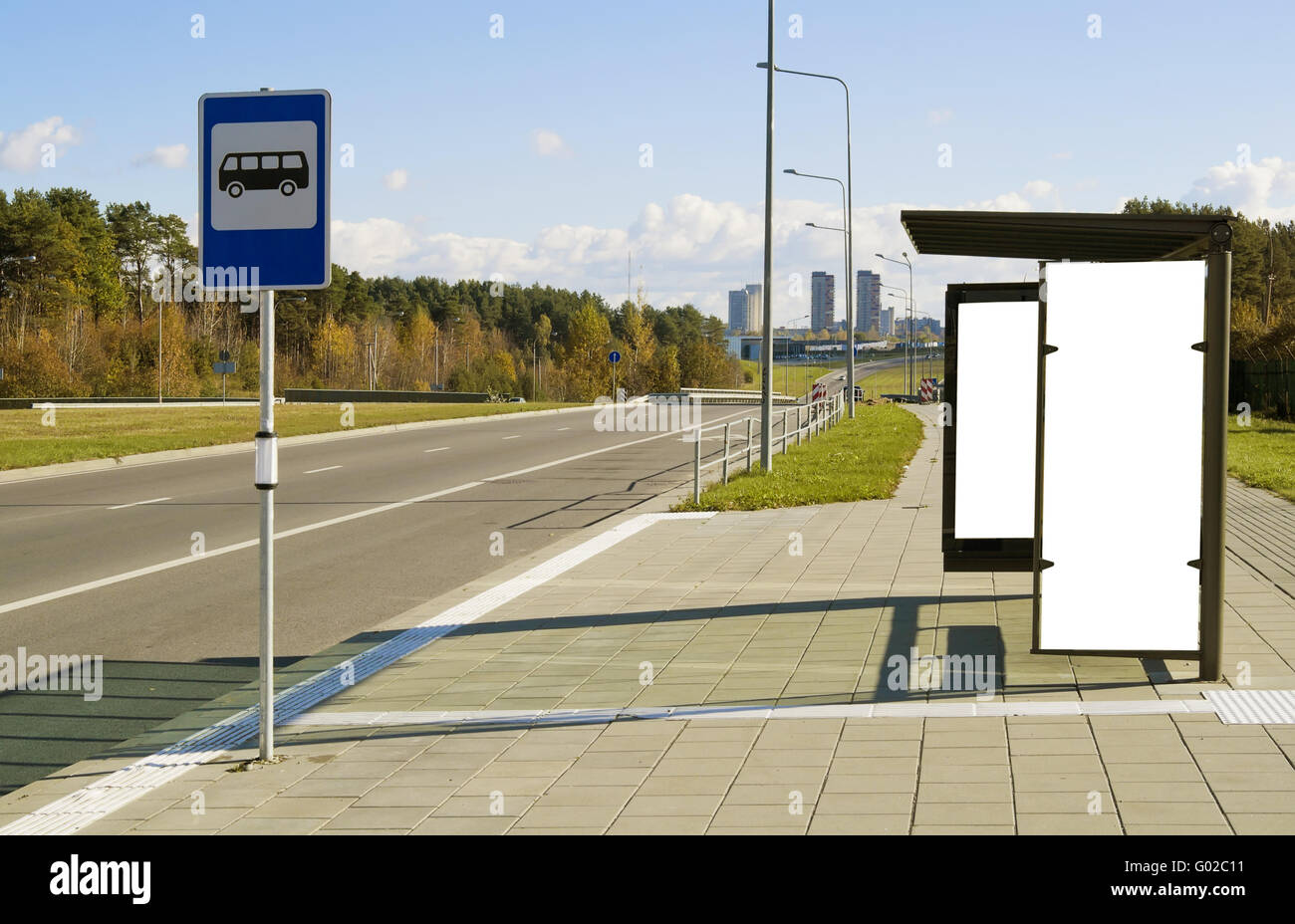 Bus stop on a high-speed highway near to a megacity Stock Photo - Alamy