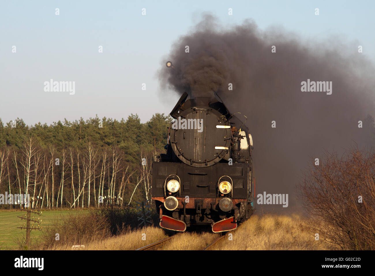 Vintage steam train passing through countryside Stock Photo - Alamy