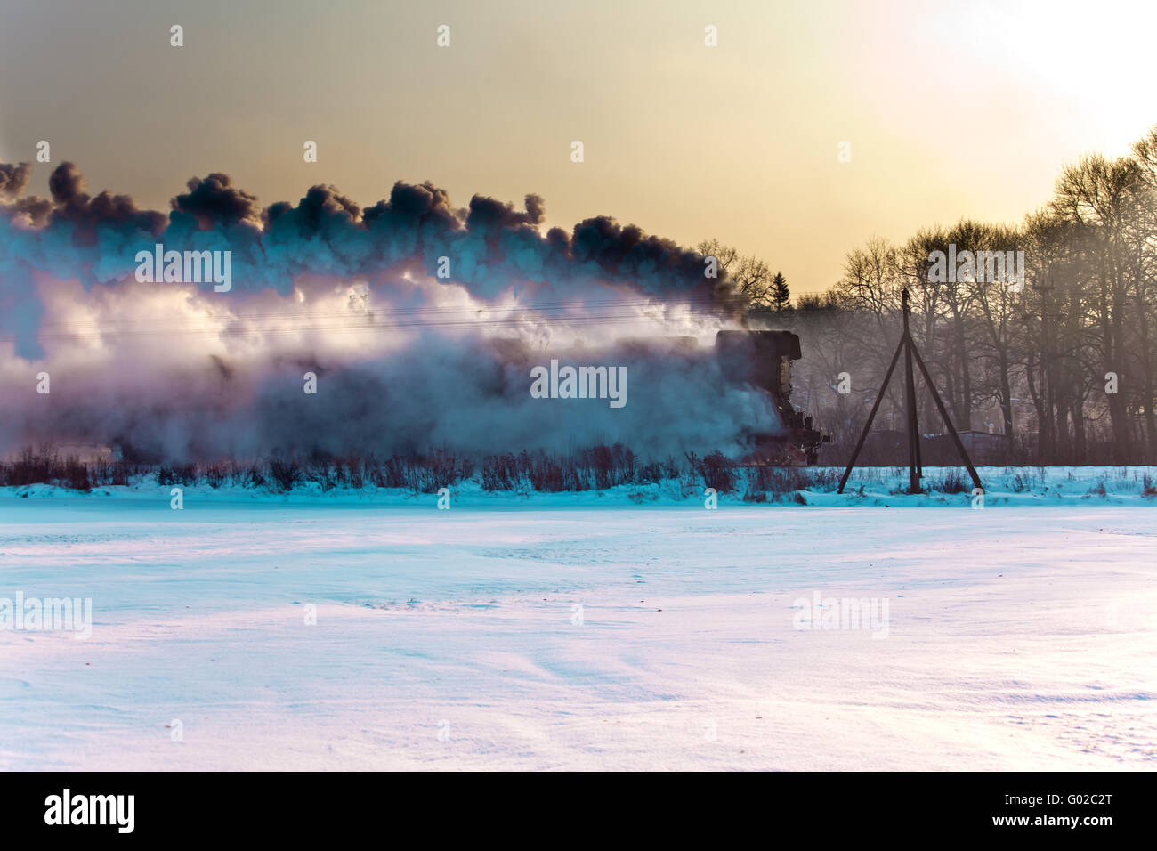 Vintage steam train starting from the station Stock Photo - Alamy
