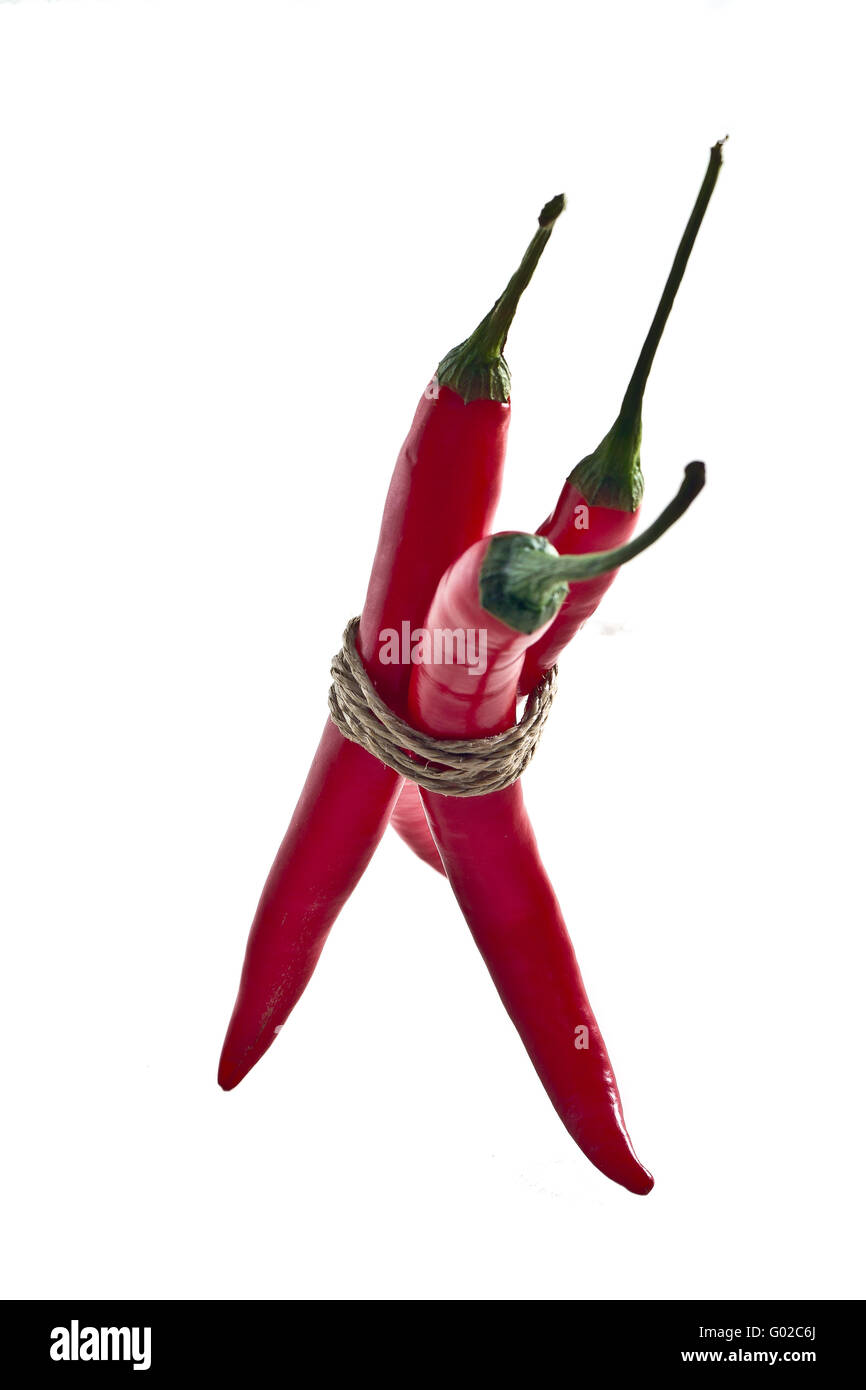 bunch of red hot chilli pepper, tied by rope Stock Photo - Alamy
