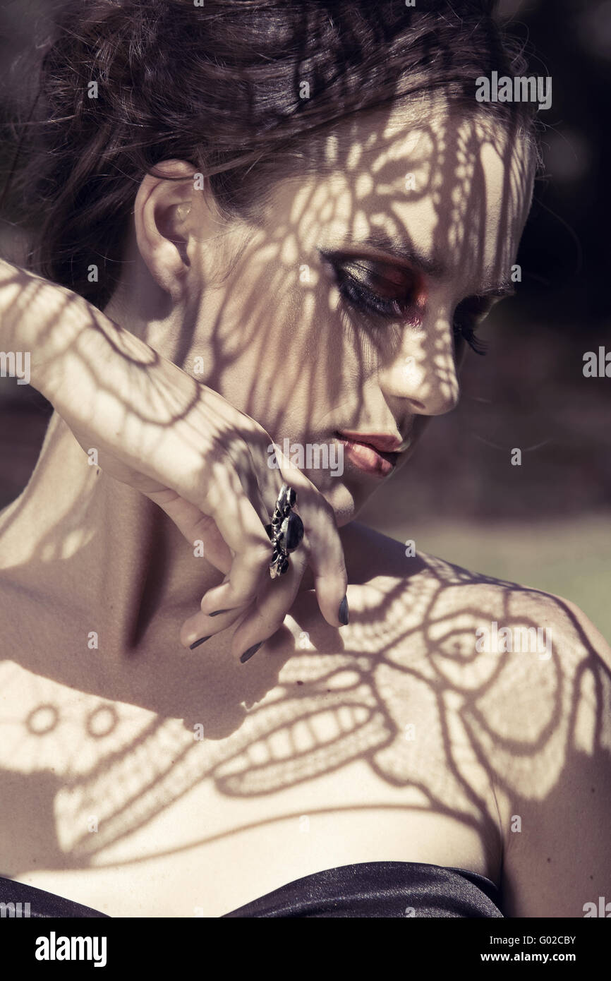 beautiful woman with lace shadows Stock Photo - Alamy