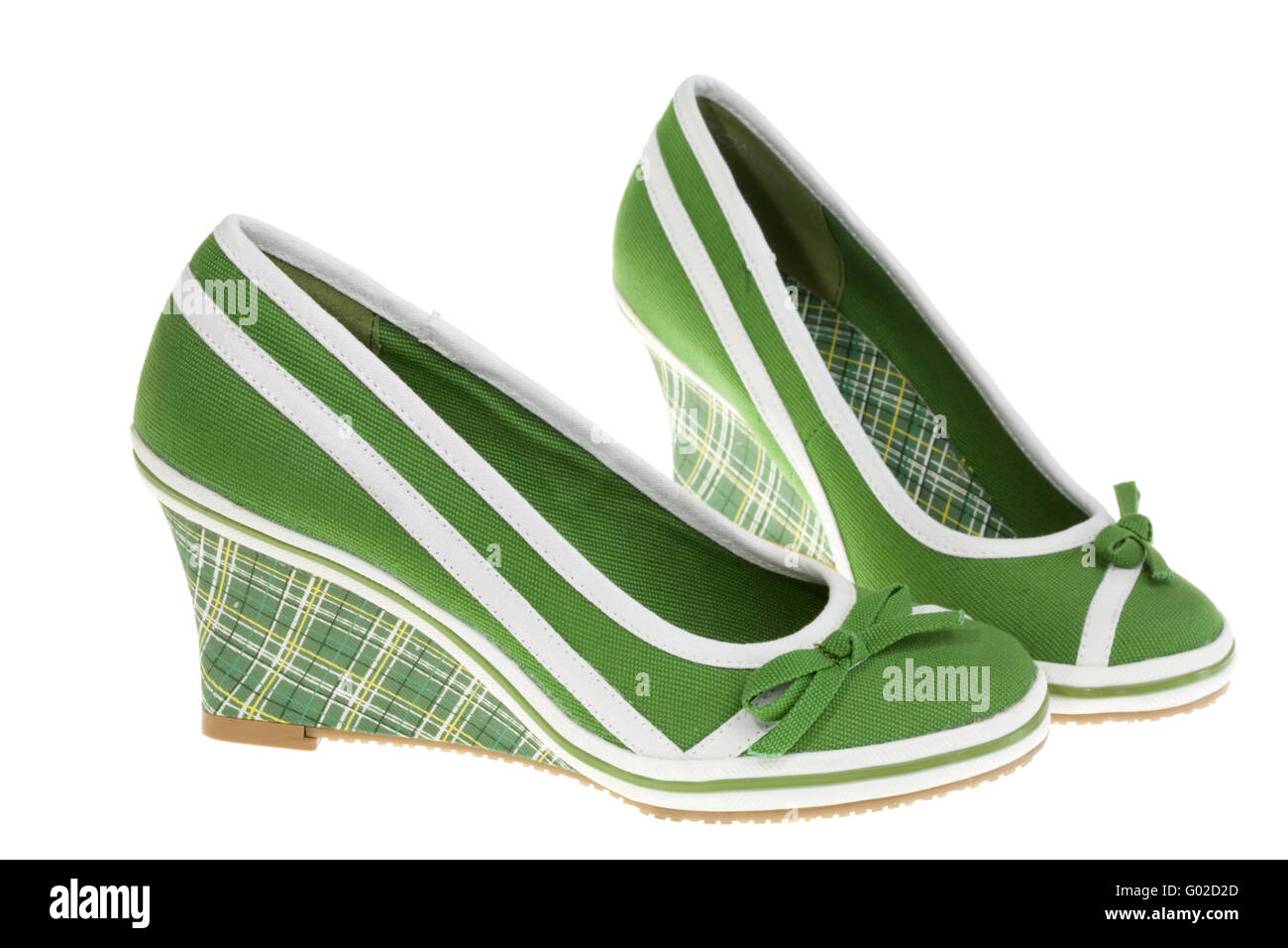 Girls' shoes on white Stock Photo - Alamy