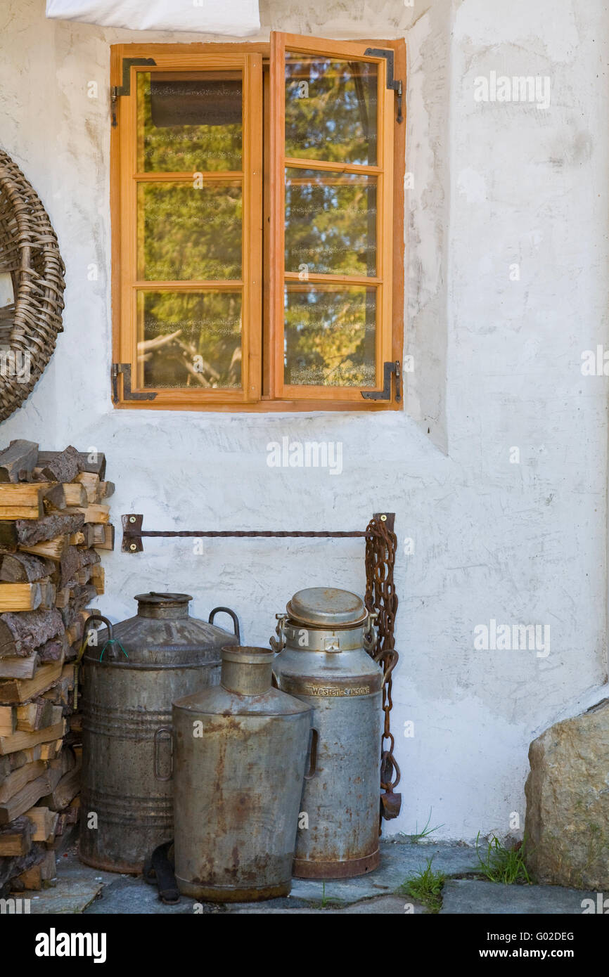 Window with milk barrels Stock Photo - Alamy