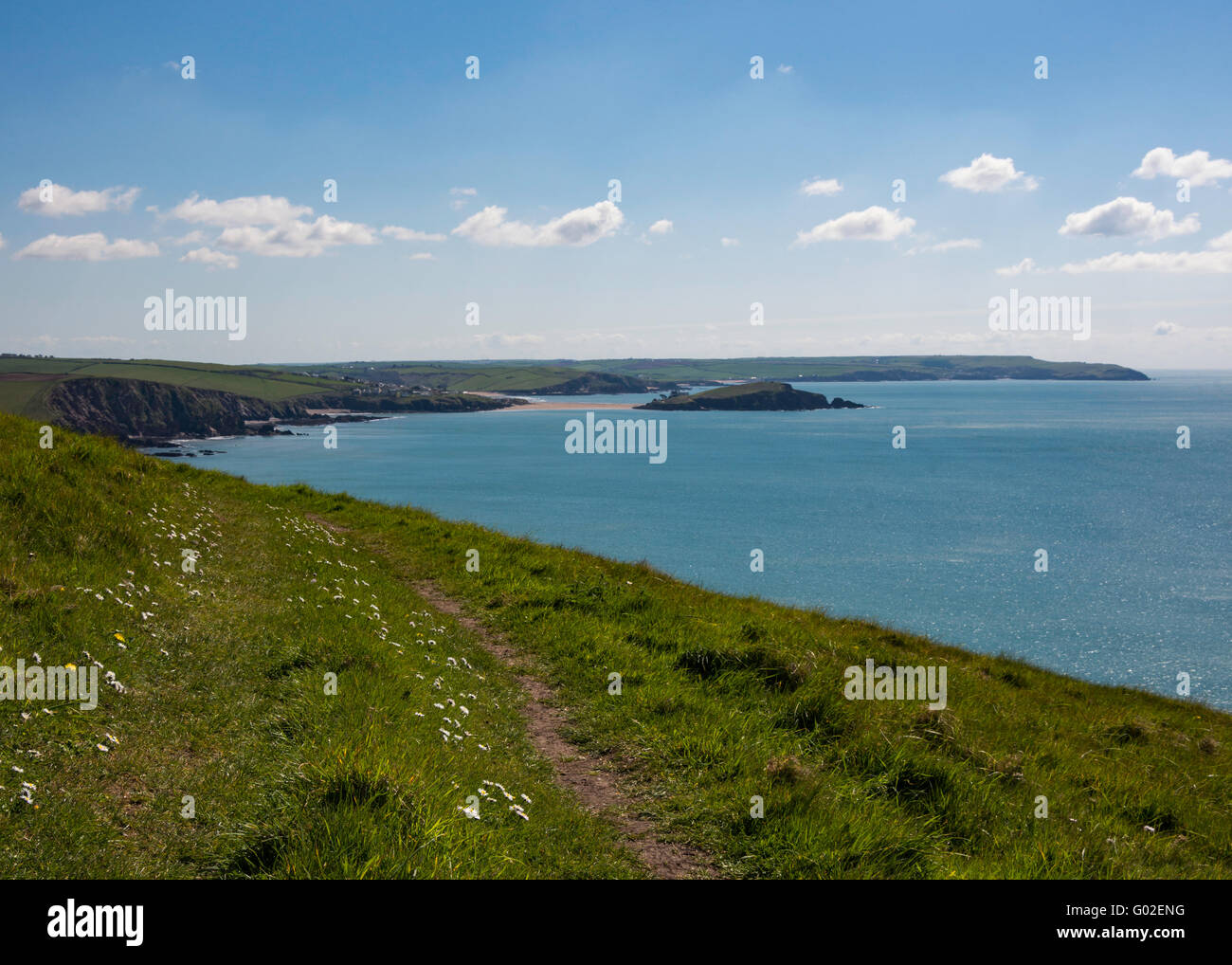 Coastal landscape of South West coastpath in South Devon looking East ...