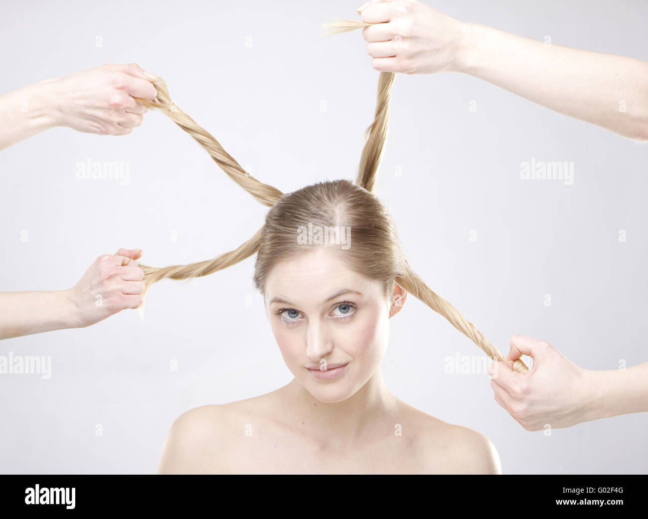 metaphorical image of hands holding different styles of rolls of a ...