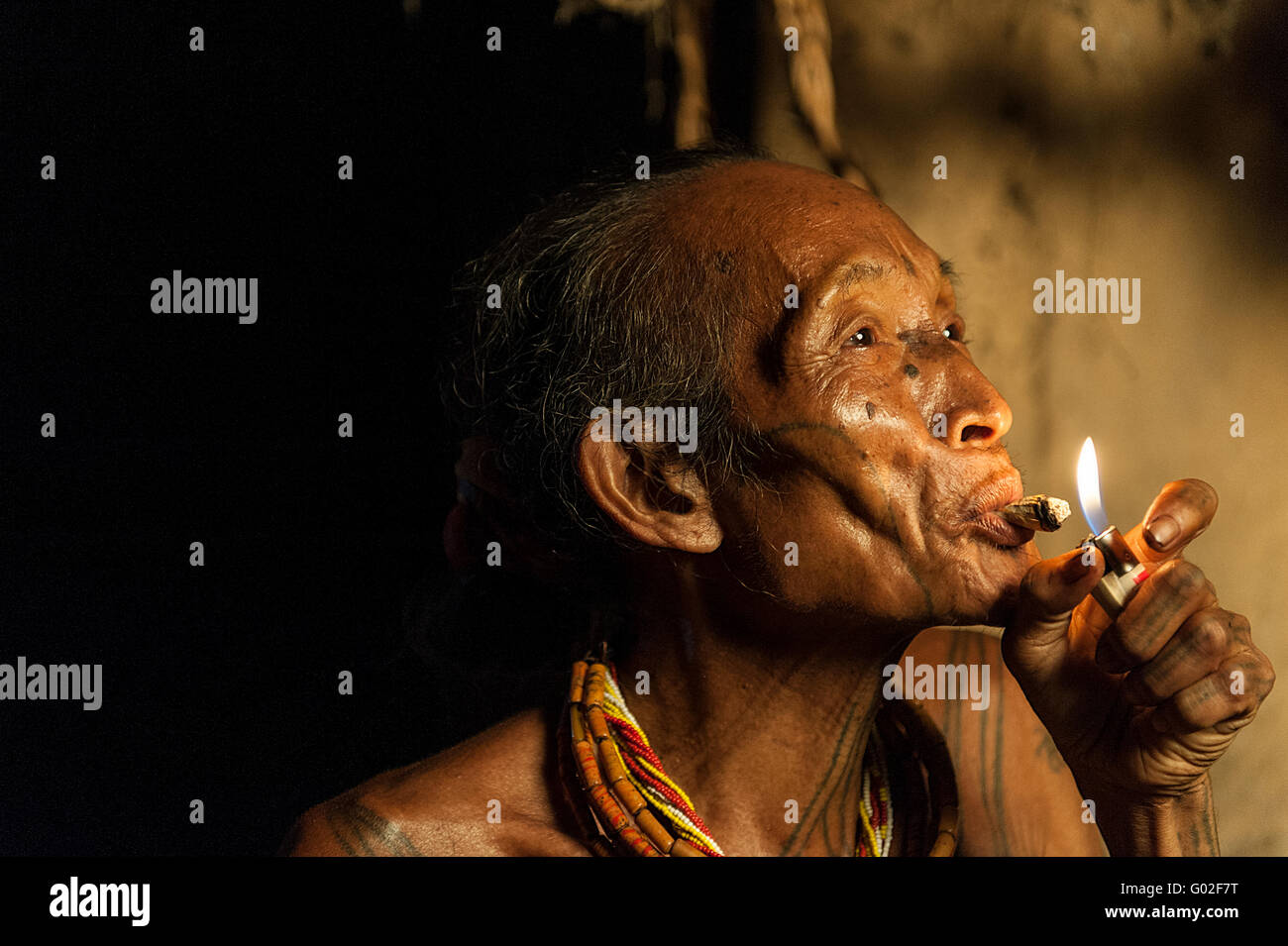 Poto, 67, the Mentawai tribe pose for camera Stock Photo - Alamy