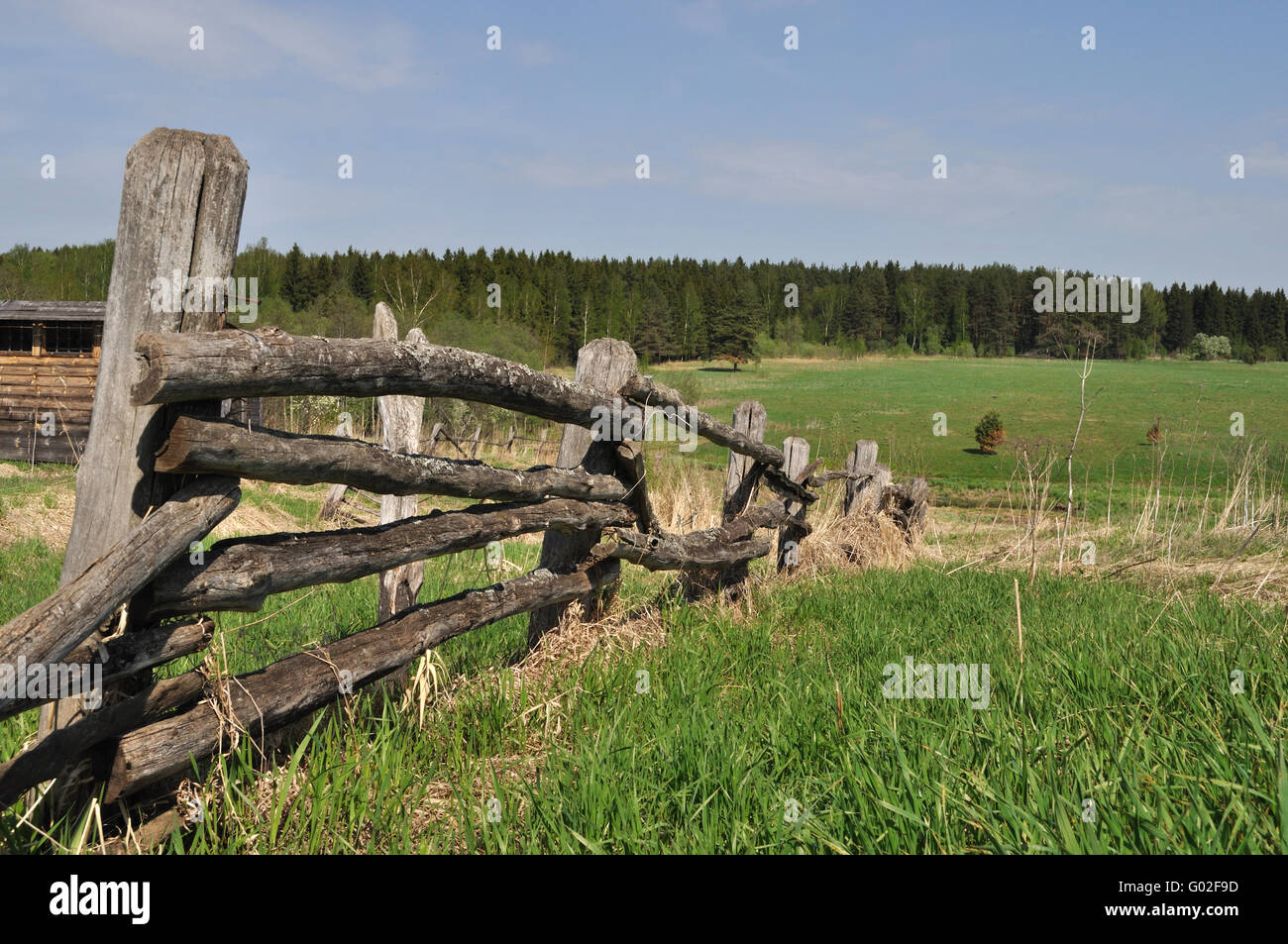 View of outskirts and pole fence in russian village Stock Photo - Alamy
