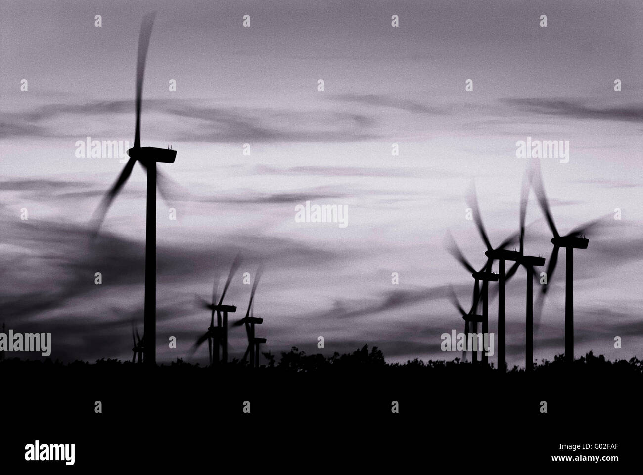Warm tone black and white image of wind power turb Stock Photo - Alamy